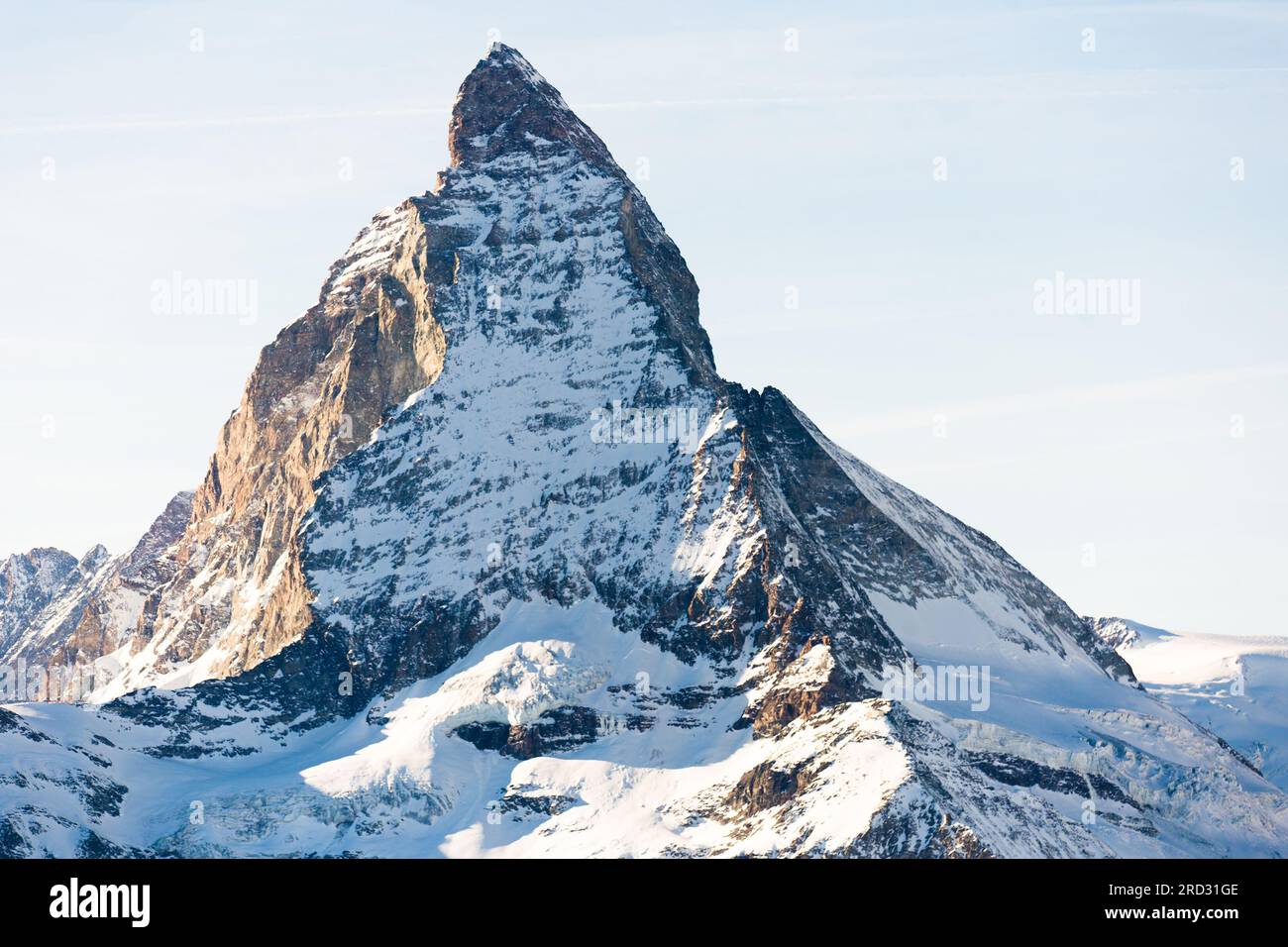 Snowy mountain Matterhorn during the day in winter. Zermatt, swiss alps ...