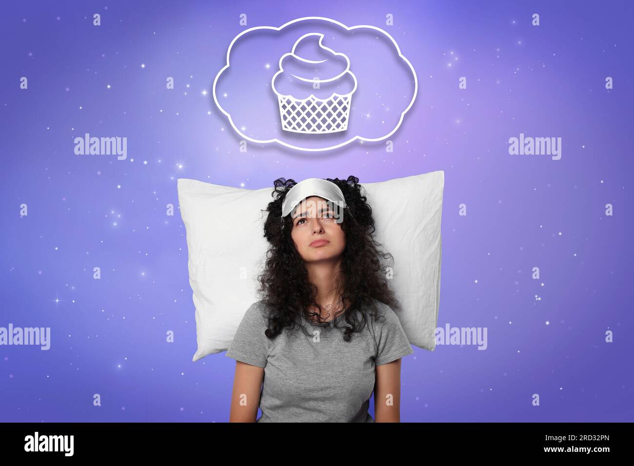 Insomnia. Woman can`t fall asleep because of hunger against starry ...
