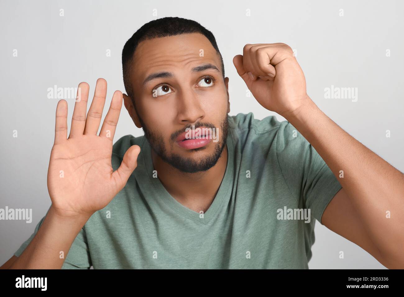 Scared man stuck to transparent screen. Internet addiction concept ...