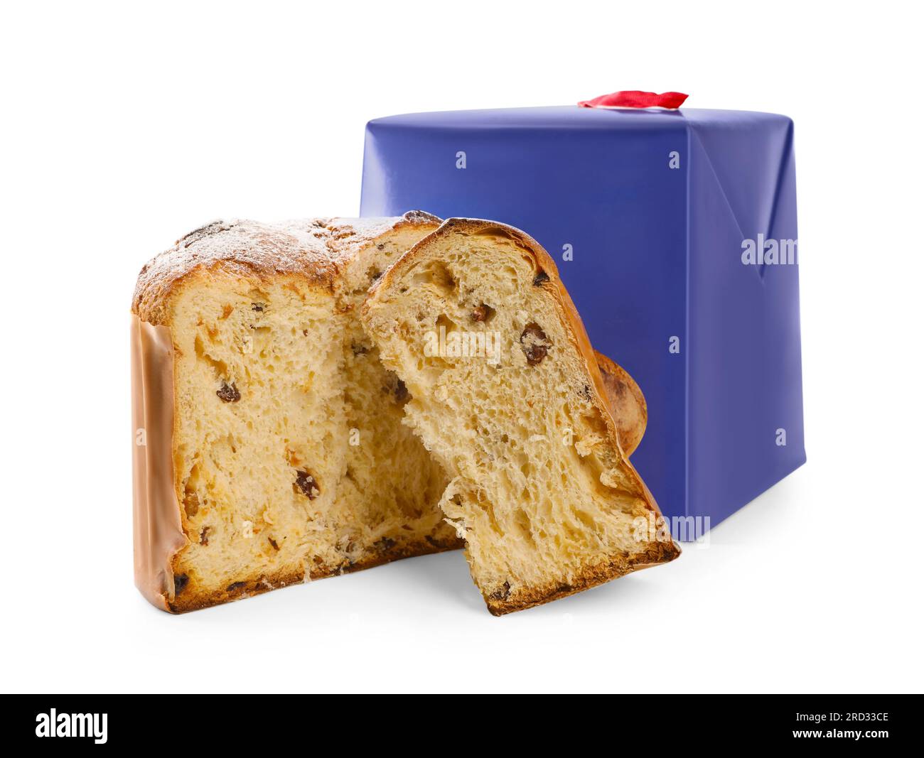 Delicious cut Panettone cake with powdered sugar and box on white ...