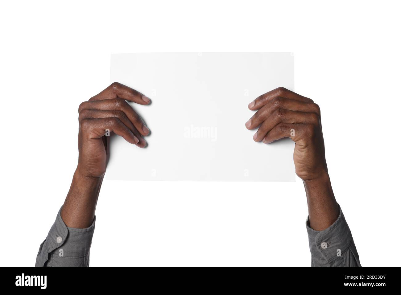 African American man holding sheet of paper on white background ...