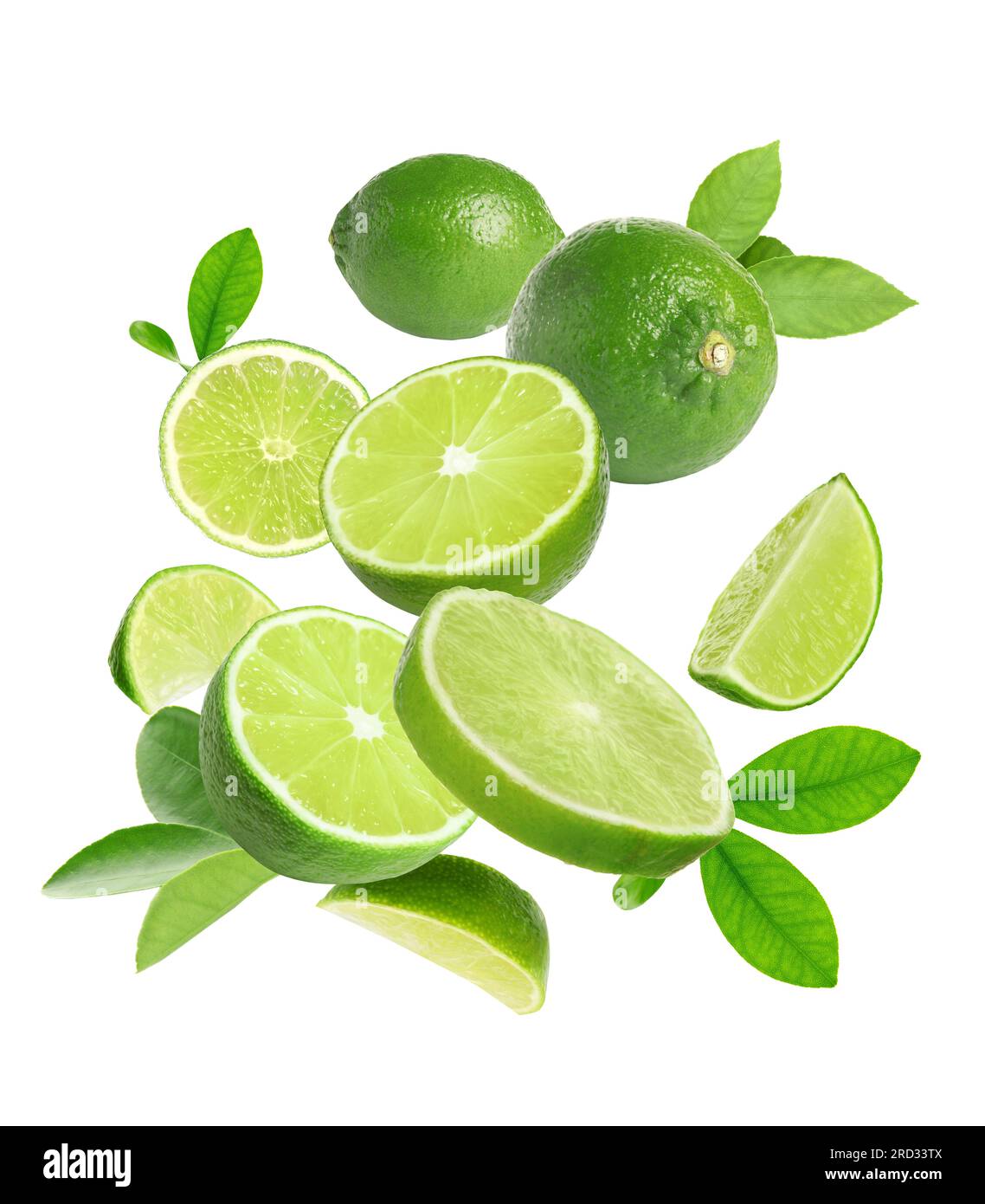 Fresh lime fruits and green leaves falling on white background Stock ...