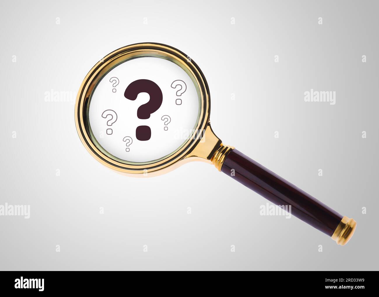 Question marks on light background, view through magnifying glass Stock ...