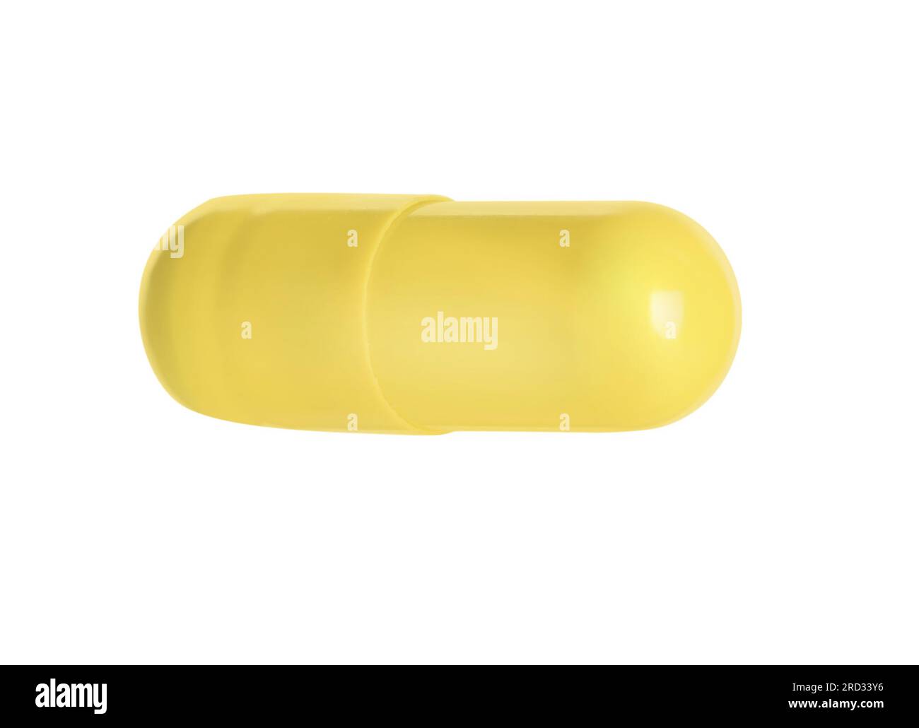 One yellow pill isolated on white. Medicinal treatment Stock Photo - Alamy