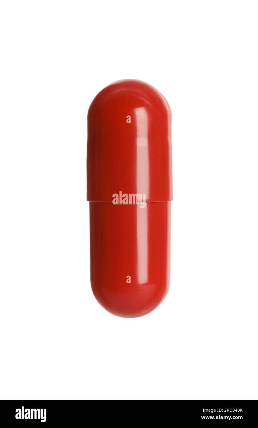 One red pill on white background. Medicinal treatment Stock Photo - Alamy