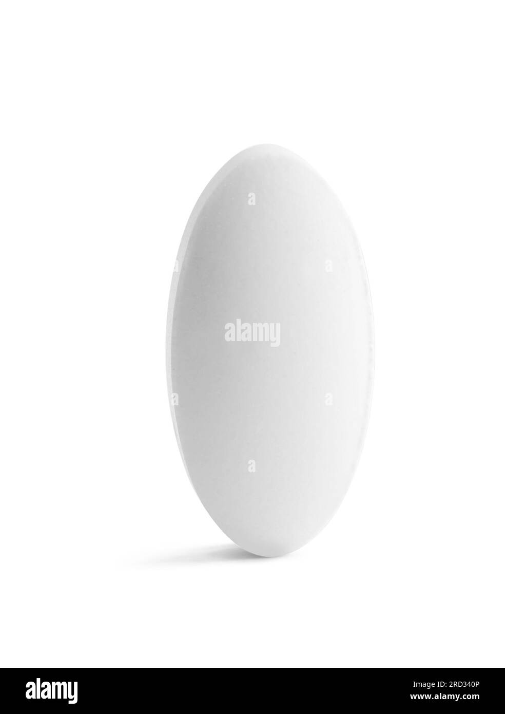 One pill on white background. Medicinal treatment Stock Photo - Alamy