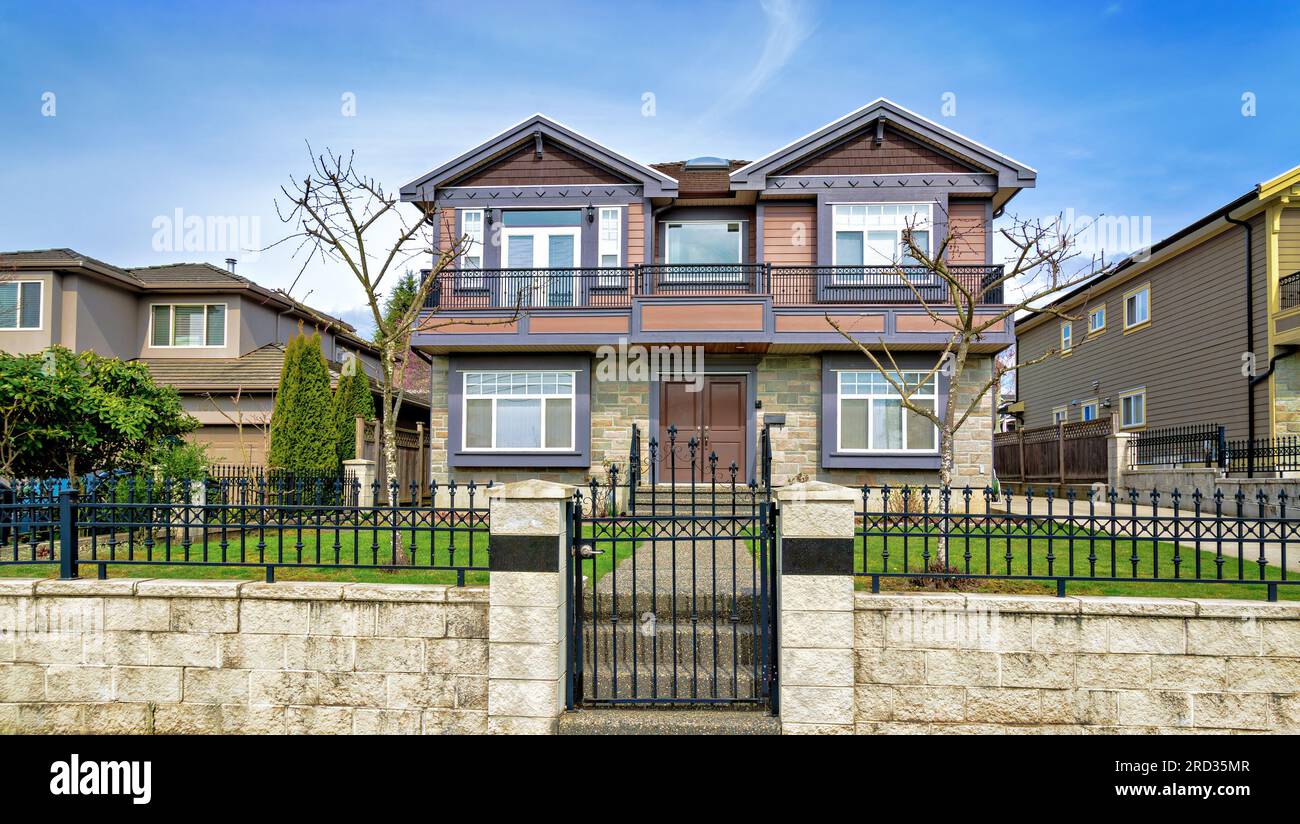 Big residential house with metal fence and gate on winter day Stock ...