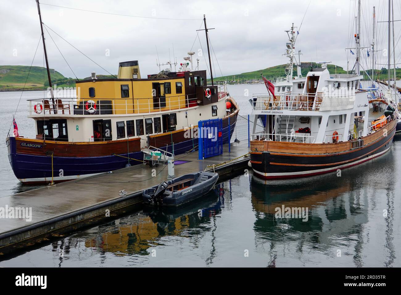 Boats moored, North Pier, including the converted traditional wooden ...