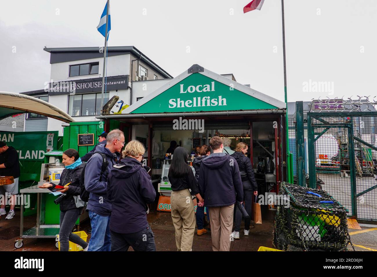 People ordering local Scottish seafood outside, Oban Seafood Hut, Green ...