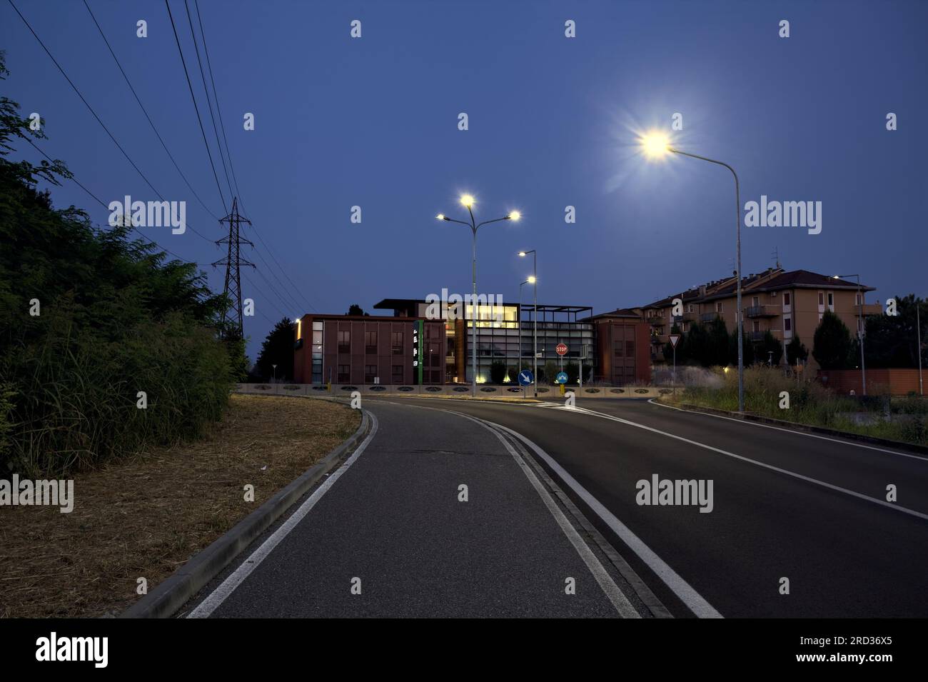 Crossroads with street lamps in a village in the italian countryside at ...