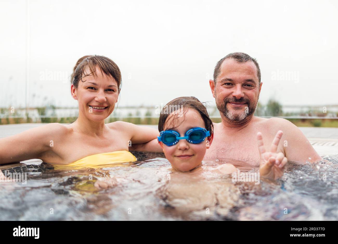 Family in a jacuzzi together hi-res stock photography and images - Alamy