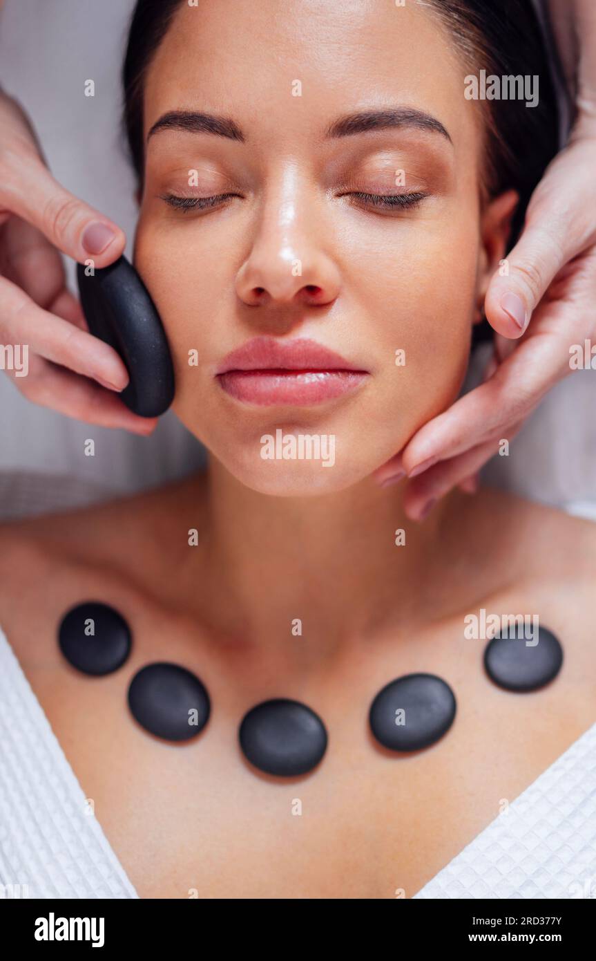 Hot stone facial hi-res stock photography and images - Alamy