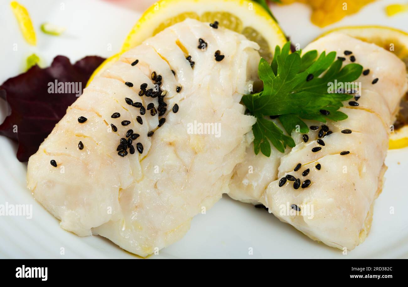 Merluccid hake fillets steamed Stock Photo - Alamy