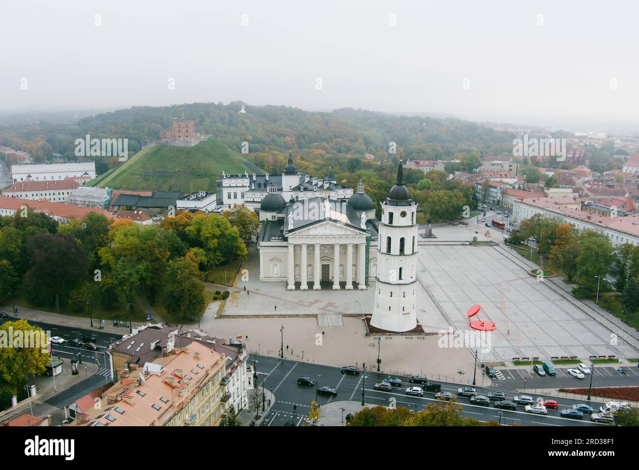 Beautiful foggy Vilnius city scene in autumn with orange and yellow ...