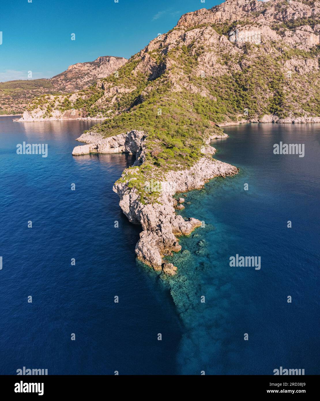 Rocky cliff aerial view. Azure sea or ocean coast. Summer resort and ...