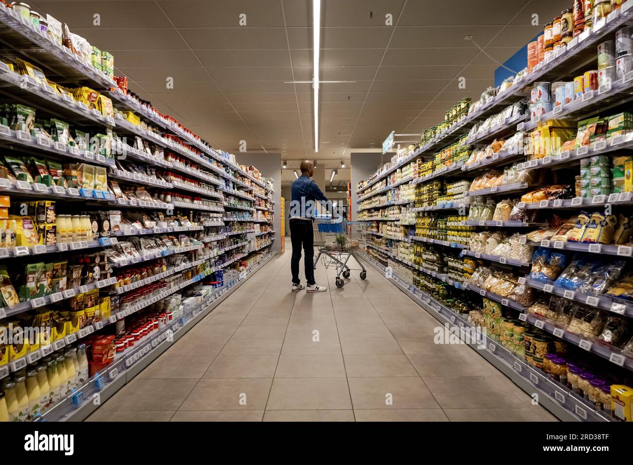 AMSTERDAM - Overview of an aisle in an Albert Heijn supermarket on ...