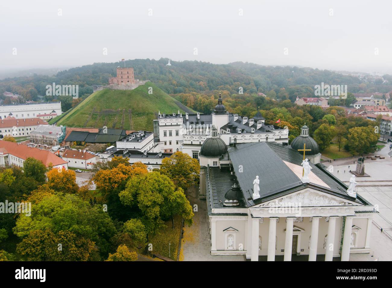 Beautiful foggy Vilnius city scene in autumn with orange and yellow ...