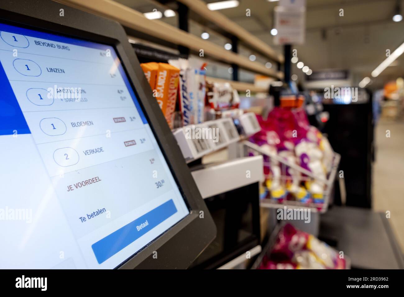 AMSTERDAM - Pay at a self-scan checkout in an Albert Heijn supermarket ...