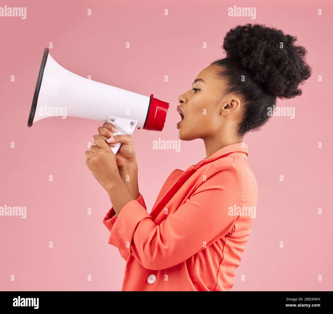 Black woman, megaphone or announcement in studio on pink background for ...