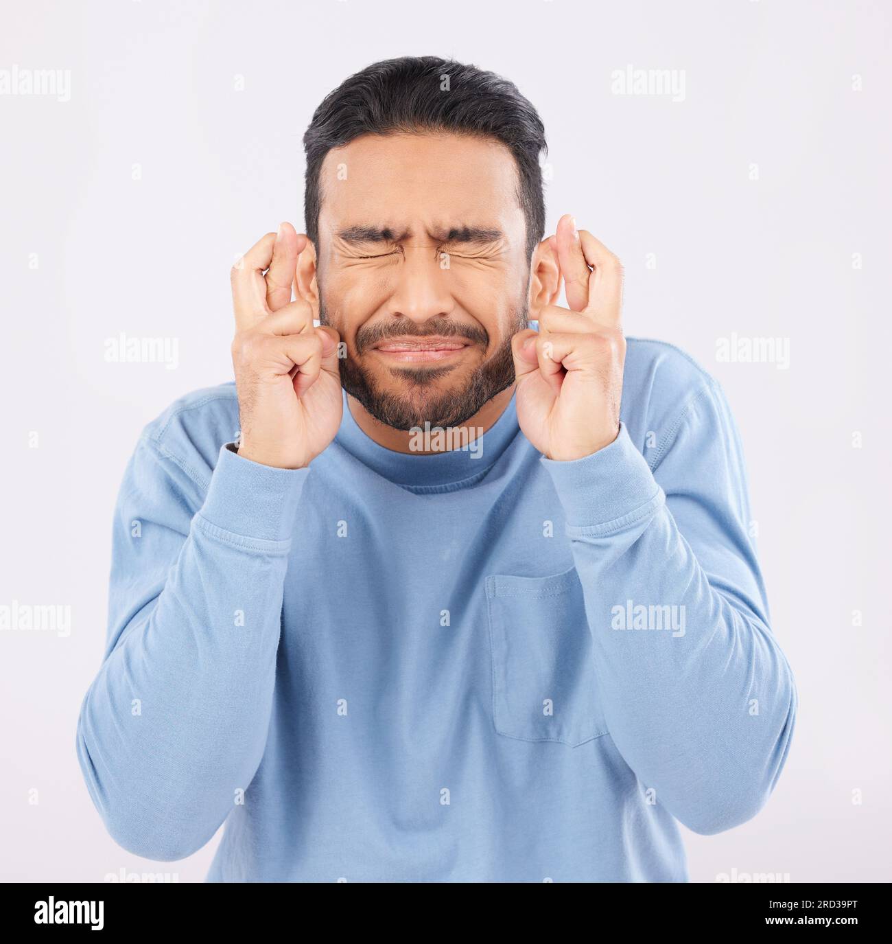 Hope, fingers crossed and asian man in studio with good luck sign for ...
