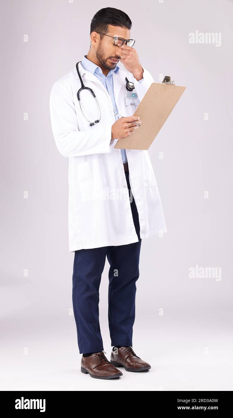 Tired man, doctor and headache with clipboard in burnout, stress or ...