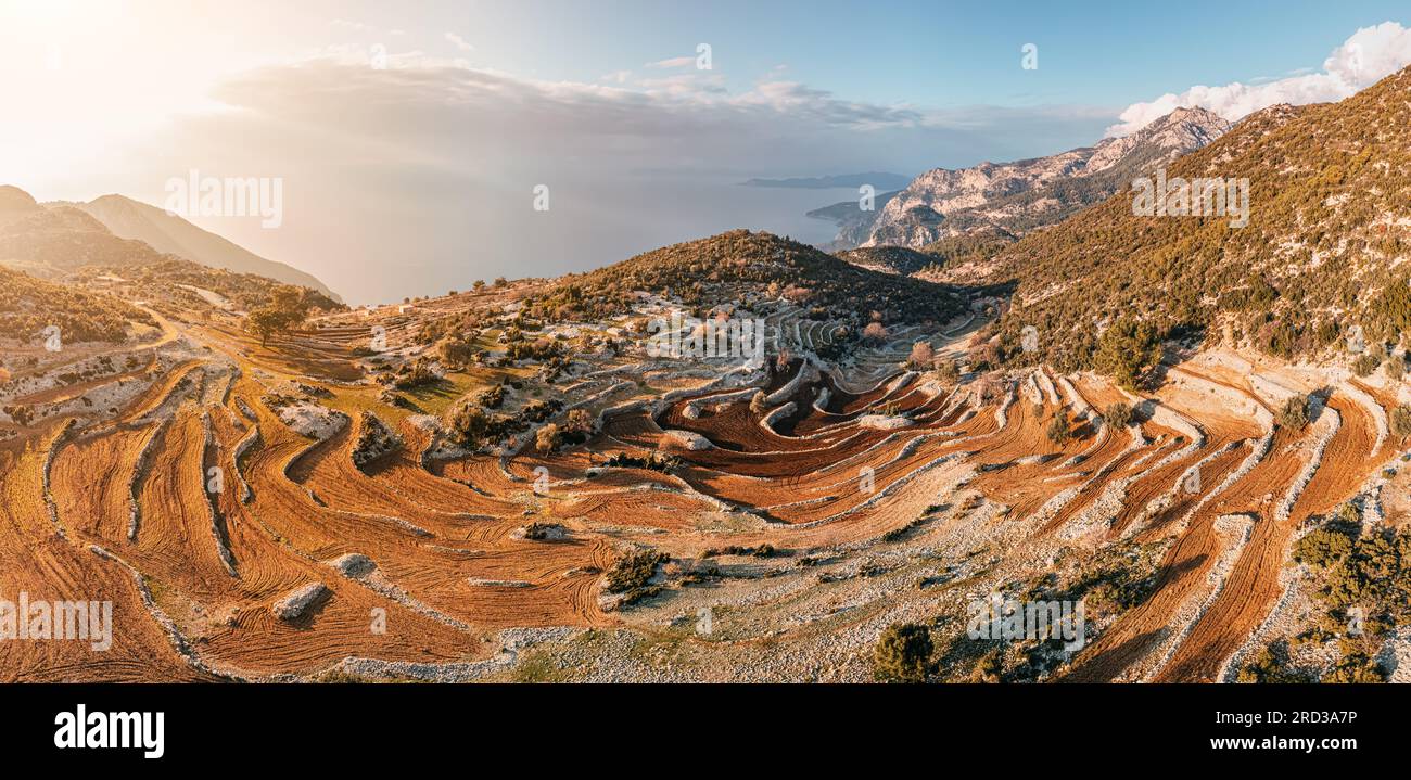 An aerial view captures the striking beauty of a plowed field with ...