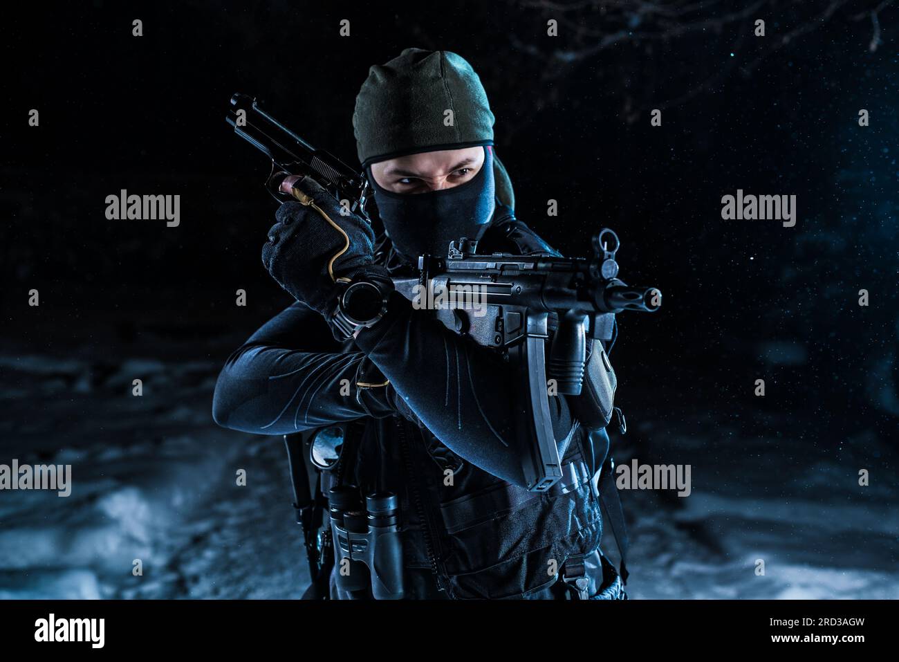 Strong man military special forces standing with gun at night Stock ...