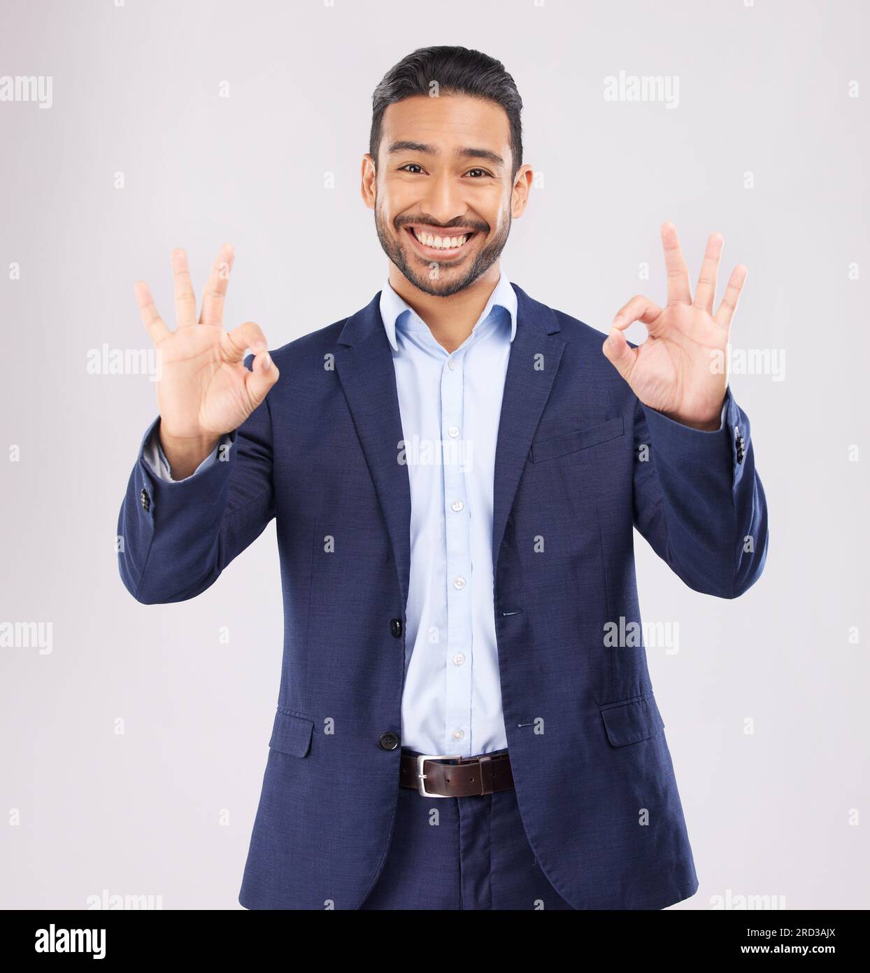 Happy, portrait and asian man with perfect sign in studio for support ...
