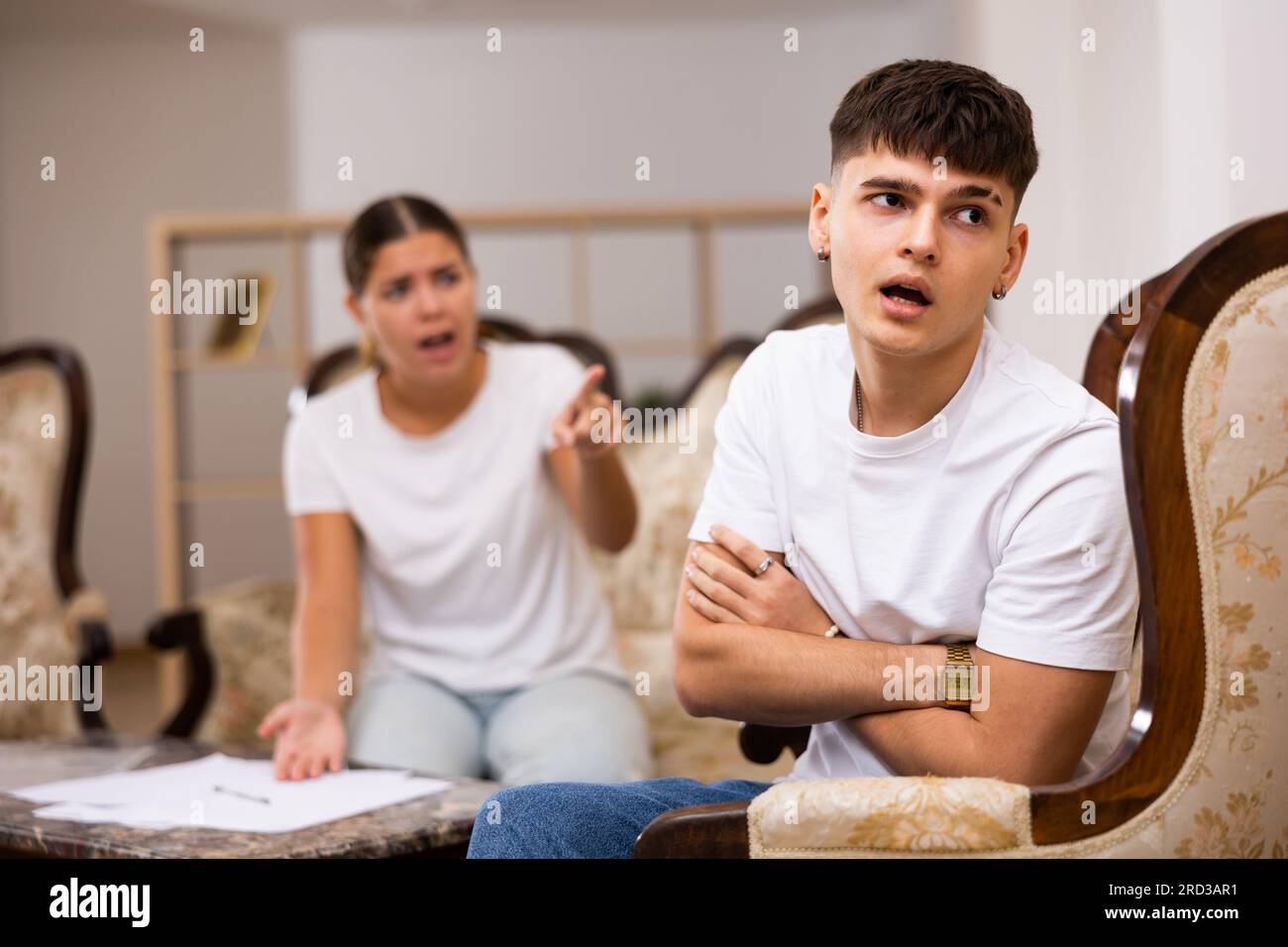 Angry young woman swears at her spouse Stock Photo - Alamy