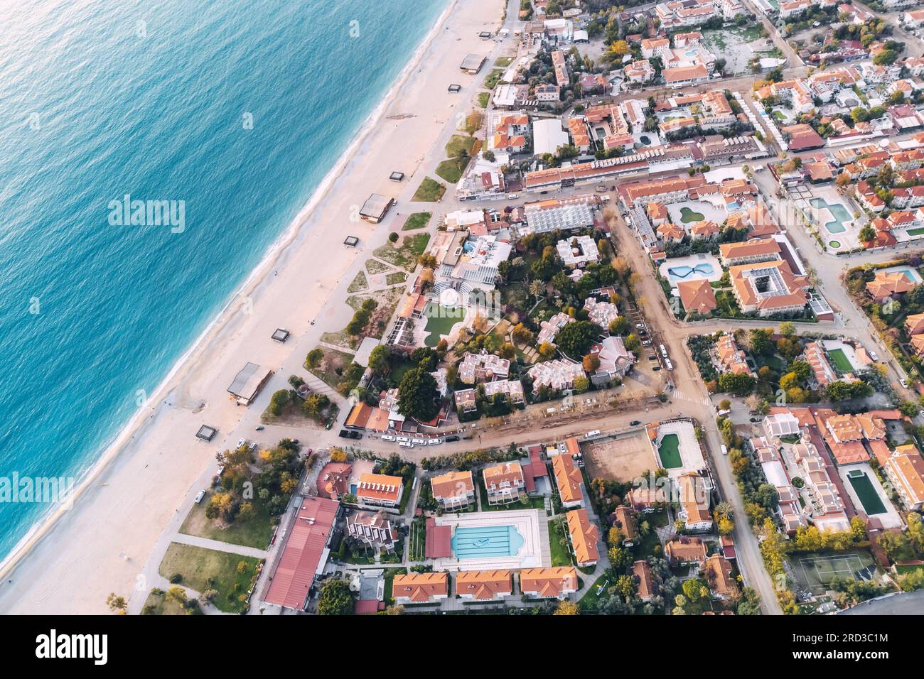 Aerial rooftop cityscape view of a resort old town and blue sea with ...