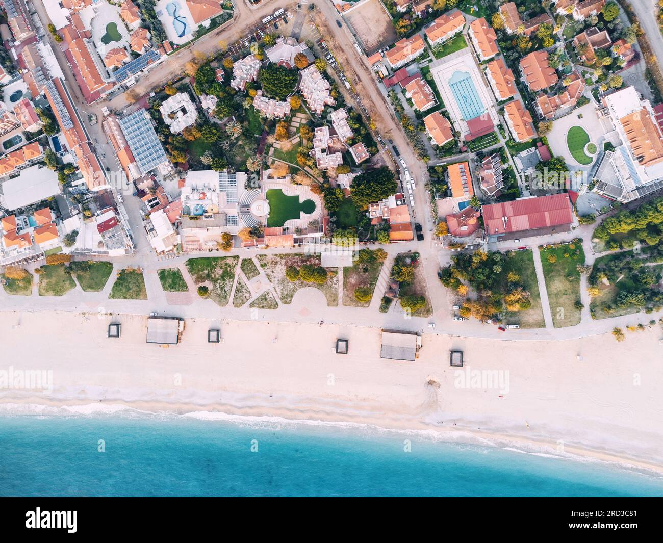 Aerial rooftop cityscape view of a resort old town and blue sea with ...