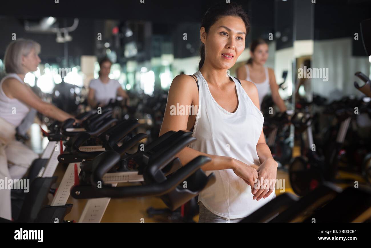 Japanese woman standing gym smiling hi-res stock photography and images ...