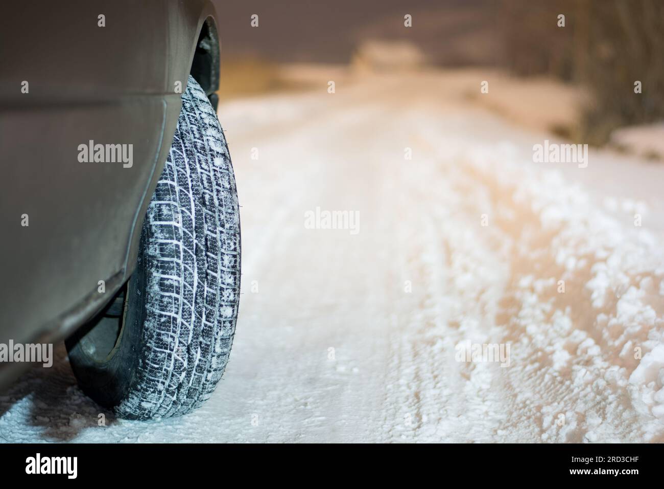 snowy winter tire in snowy road at night Stock Photo - Alamy