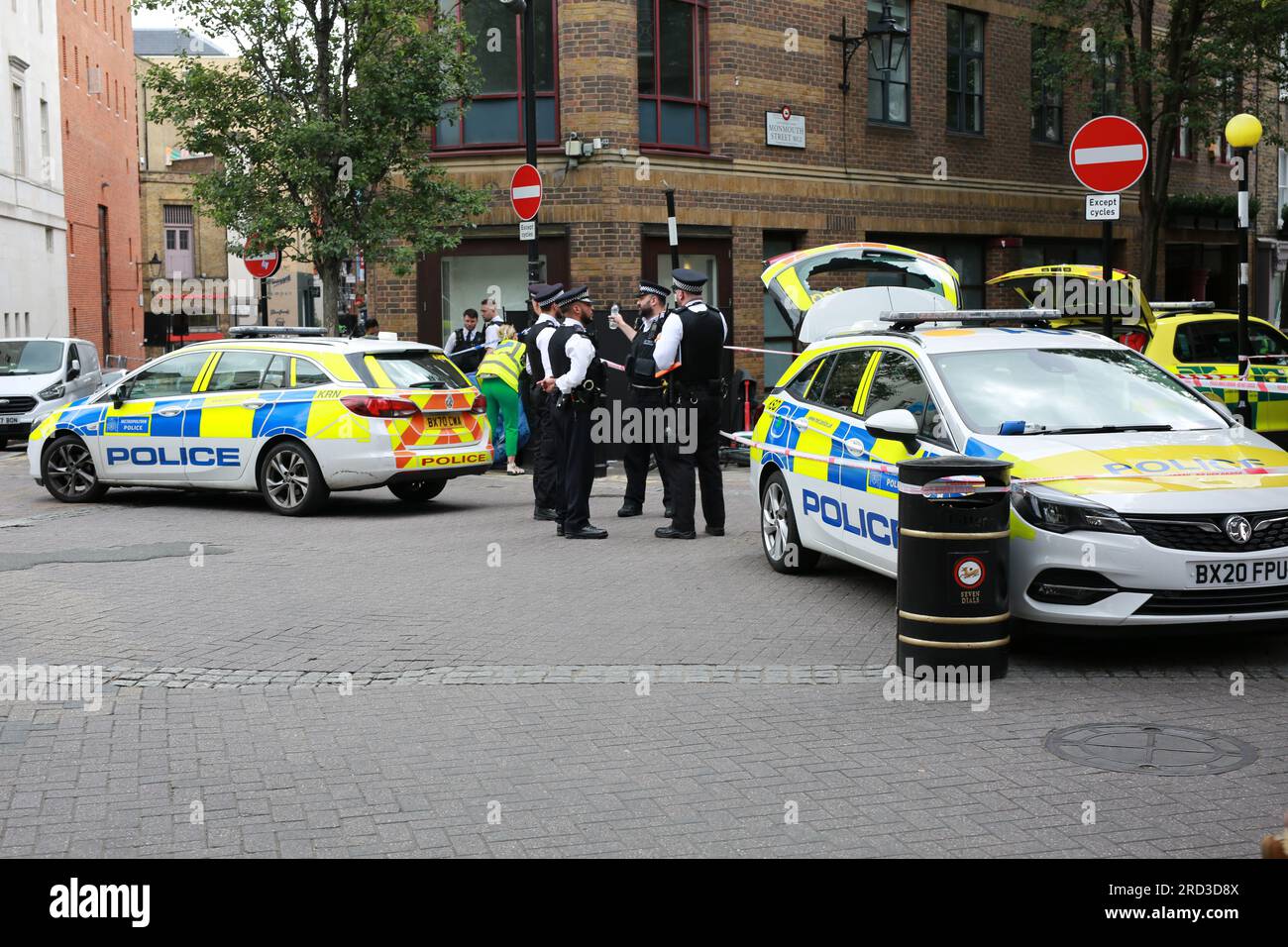London, UK. 18 July 2023. Police and ambulance services at the scene in ...