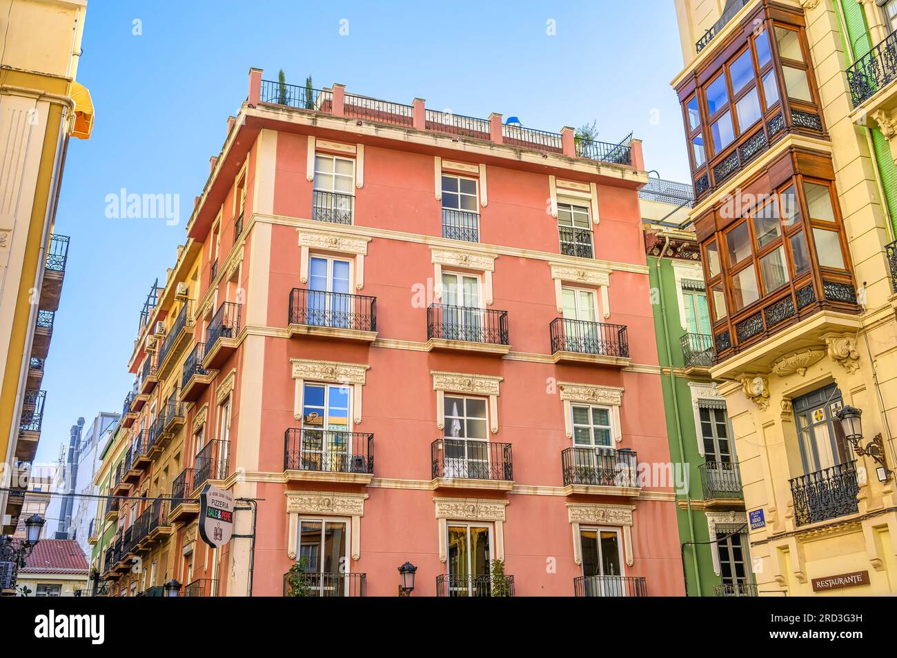Pastel colored facade of old residential buildings in the downtown ...