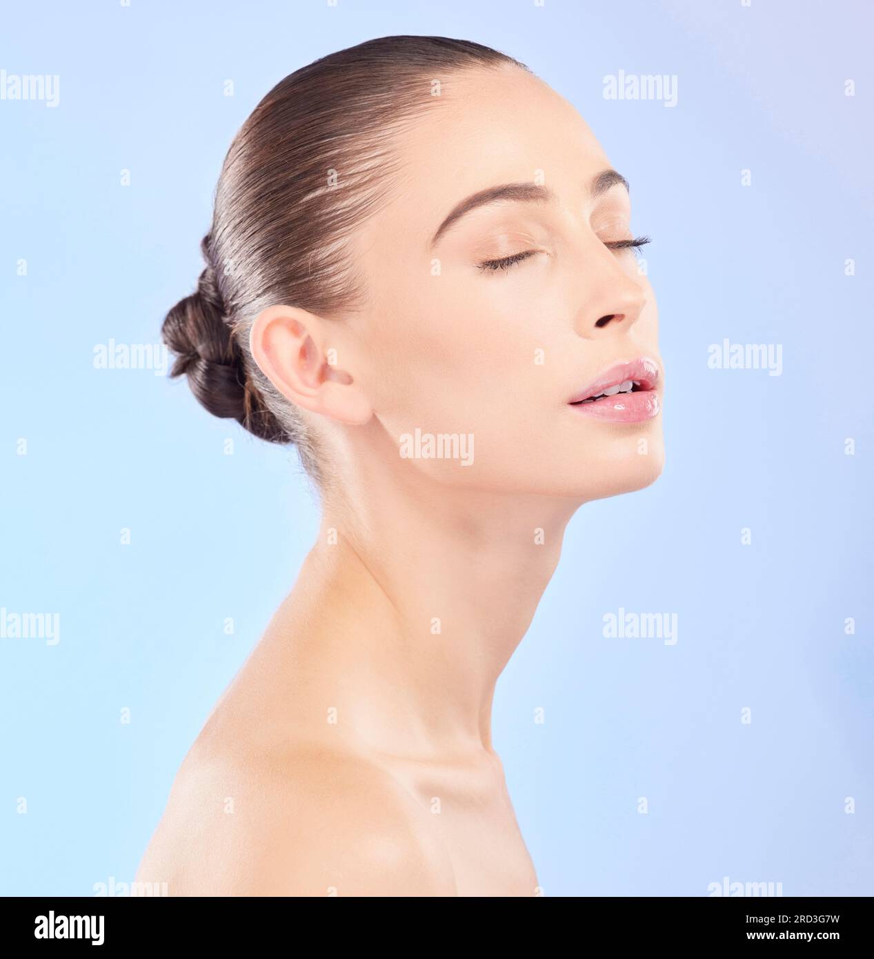 Woman, natural beauty and eyes closed in studio, blue background or ...