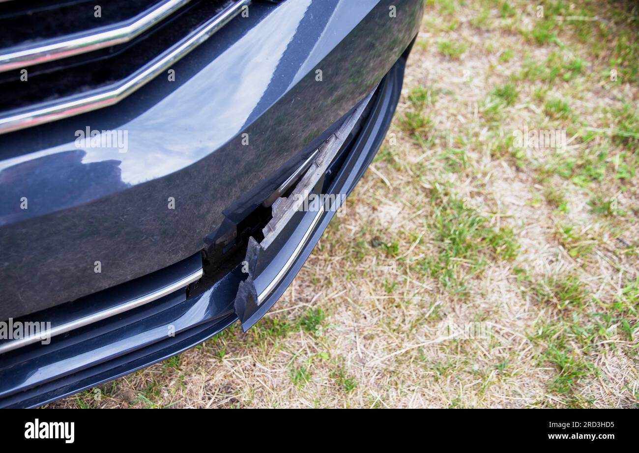 Disassembling and removing the fog lamp from a car to replace a burnt ...