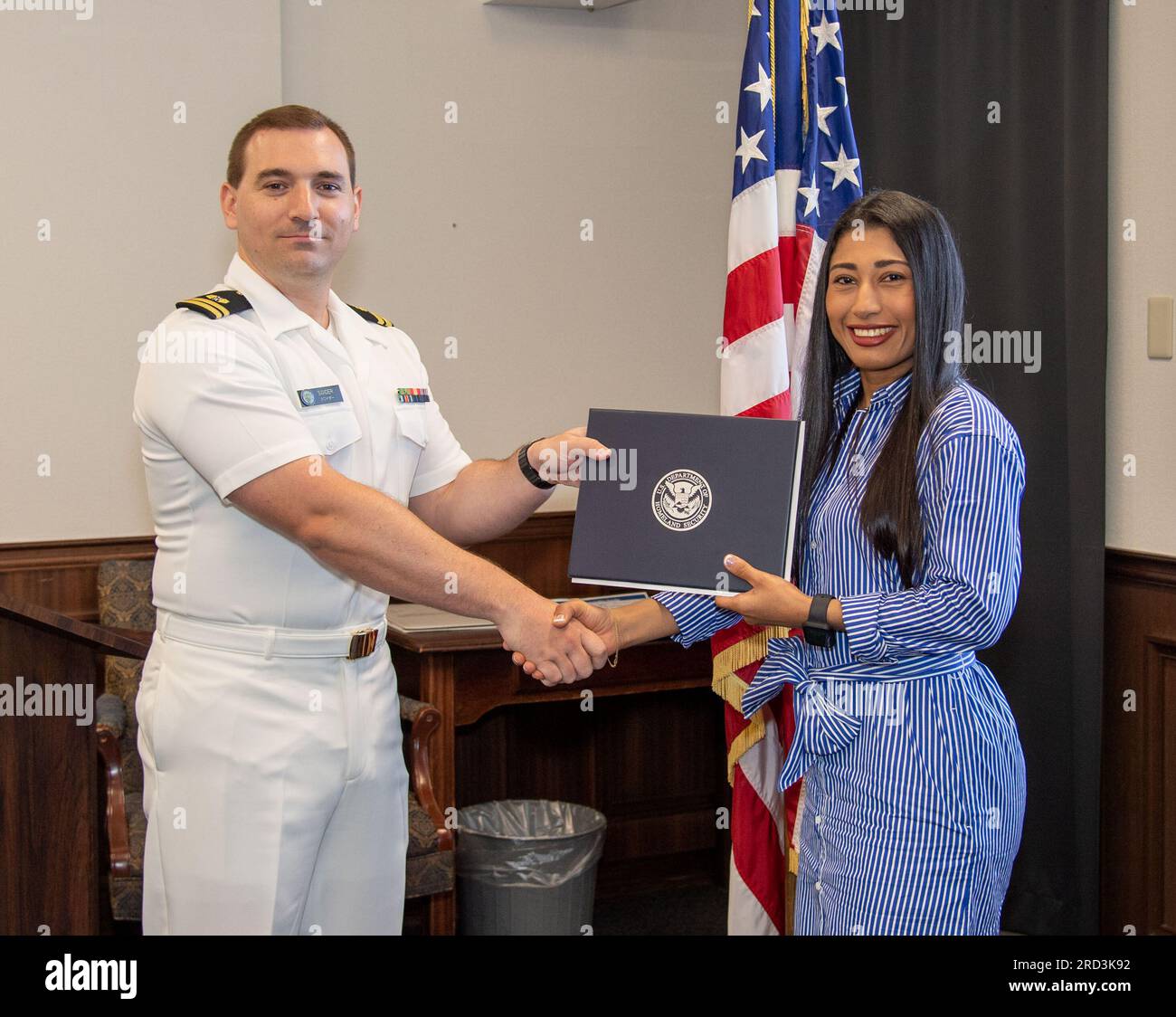 Eyllen Toalston poses for a photo with Lt. Swider Thorsten during a ...