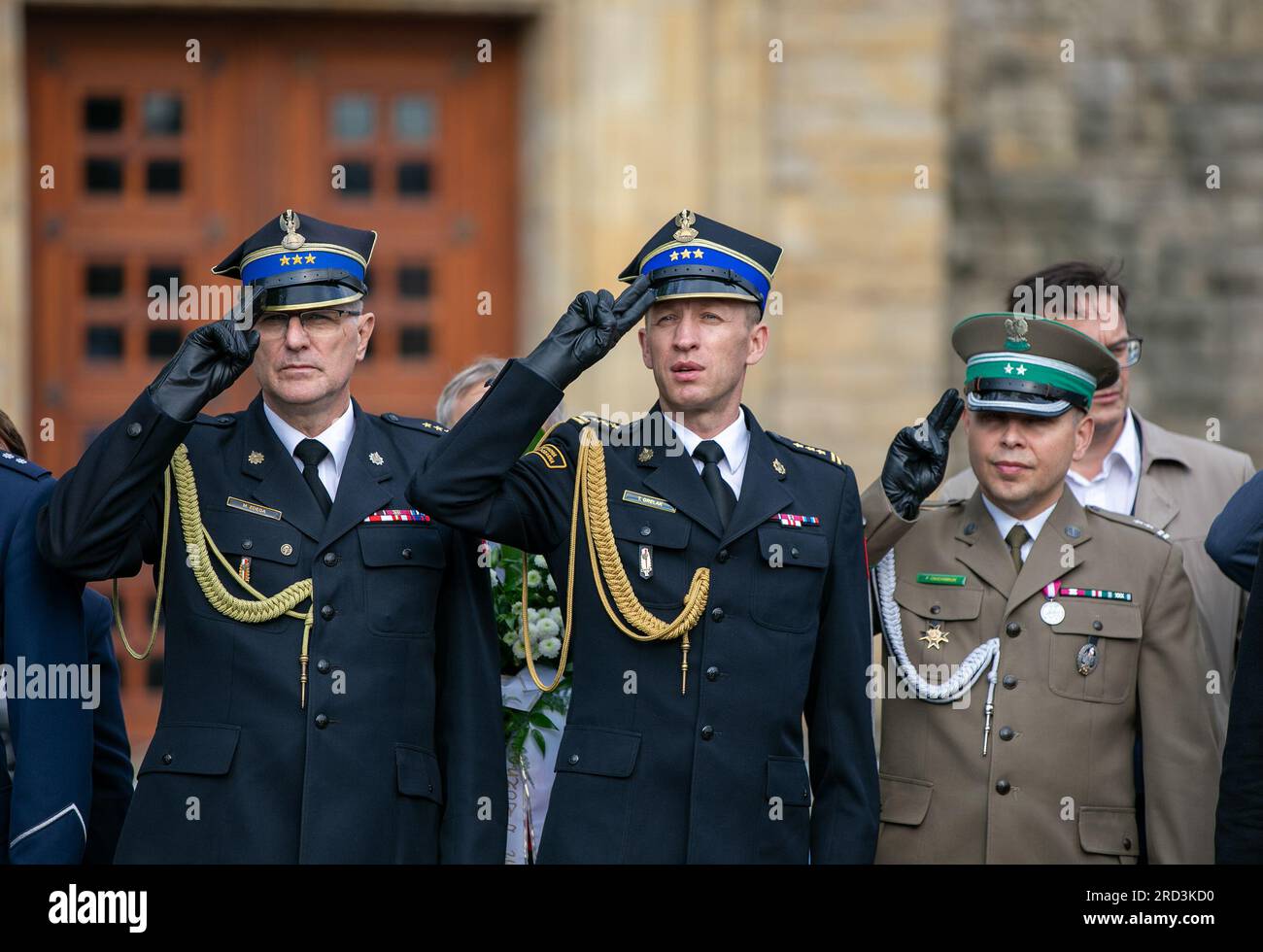 Polish military members salute during a ceremony June 28, 2023, at the ...