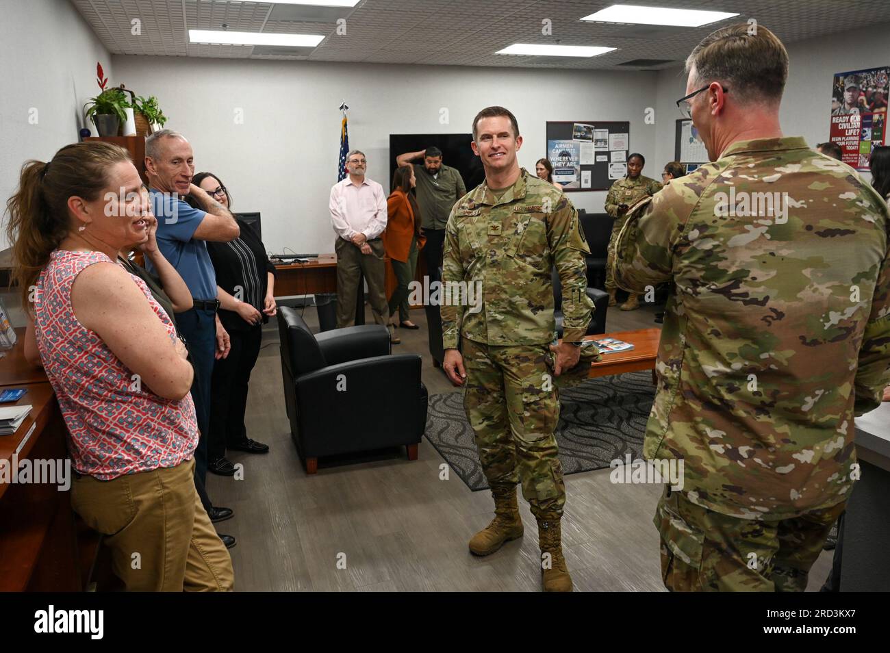 U.S. Air Force Col. Scott Mills, 355th Wing commander, converses with ...