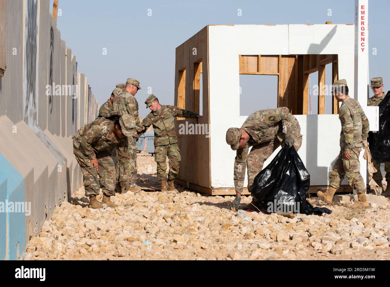 Airmen and Soldiers stationed at Prince Sultan Air Base pick-up trash ...