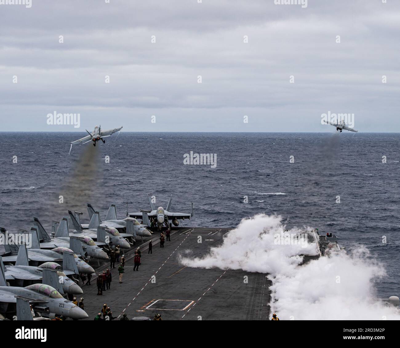 230627-N-MH015-1131 PACIFIC OCEAN (June 27, 2023) Two F/A-18F Super Hornets from the “Fighting ...