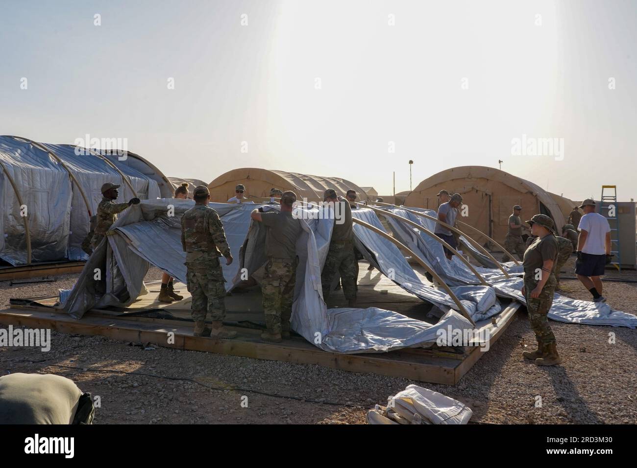Airmen from the 378th Expeditionary Civil Engineer Squadron disassemble ...
