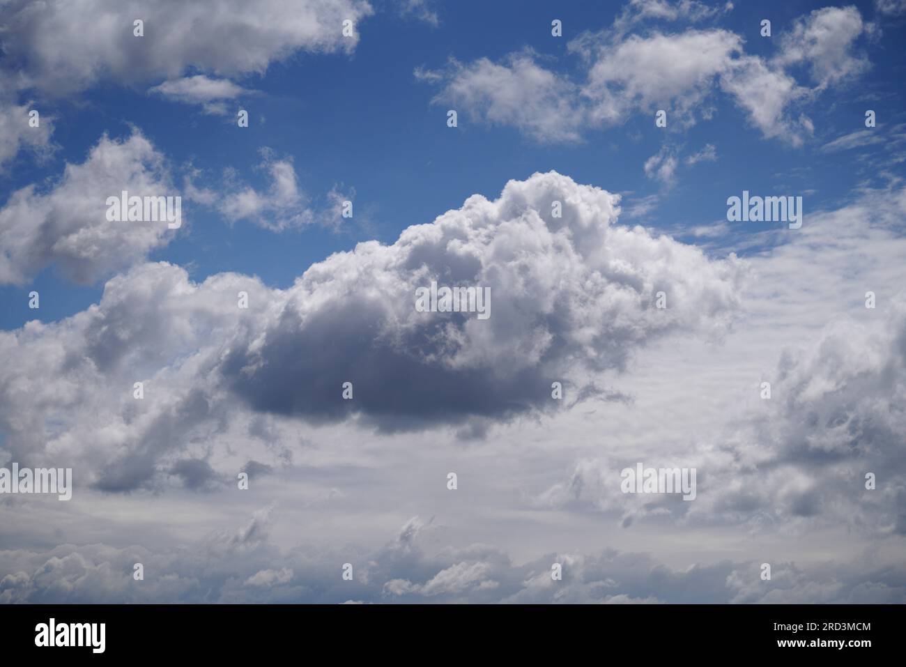 Stratus cumulus alto nimbo clouds in the blue sky are weather ...