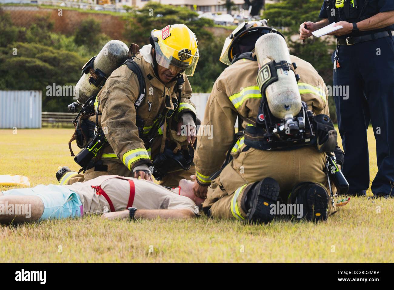 Federal firefighters treat a simulated casualty during Exercise Lethal ...