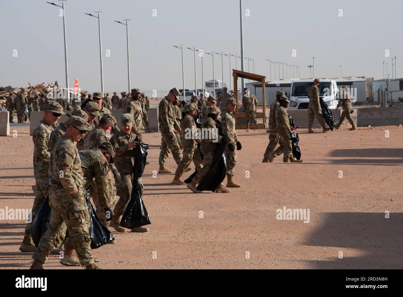 Airmen and Soldiers stationed at Prince Sultan Air Base begin combing ...