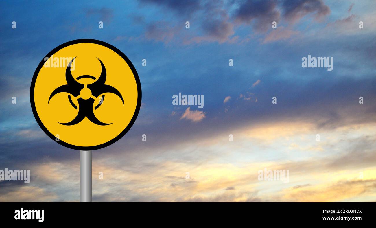 warning sign on sky background Stock Photo - Alamy