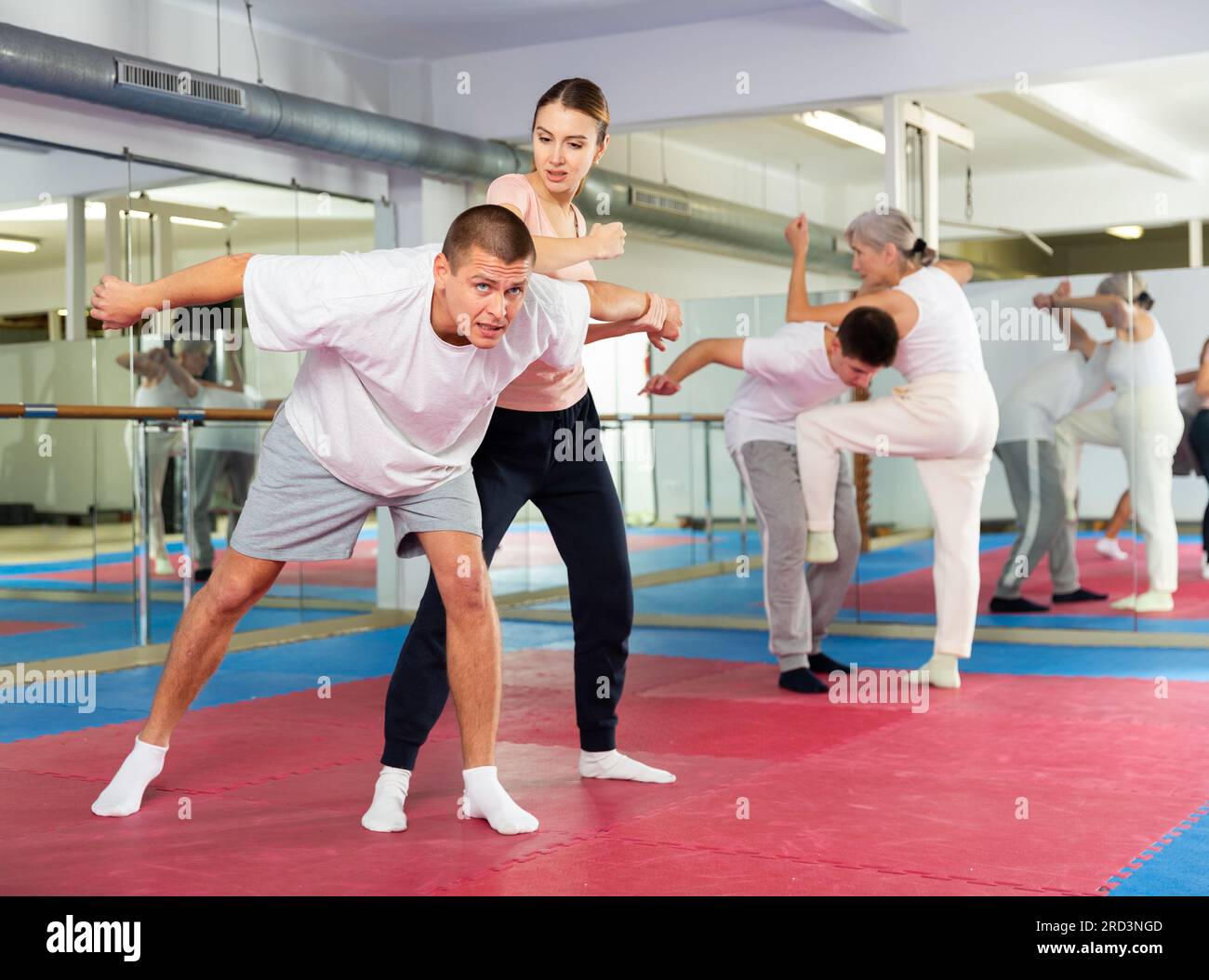 Woman performing elbow strike during self-defence training Stock Photo ...