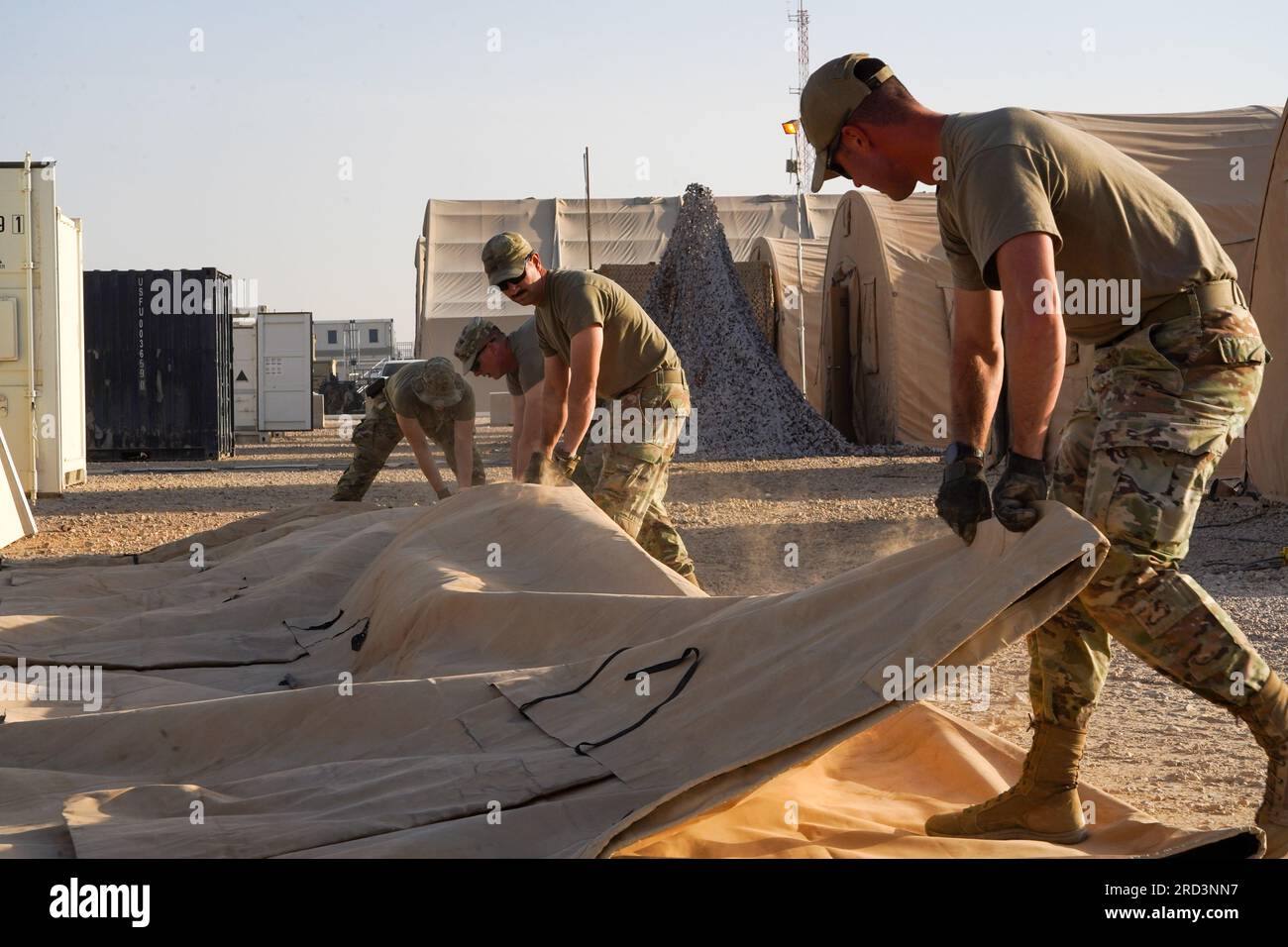 Airmen from the 378th Expeditionary Civil Engineer Squadron disassemble ...