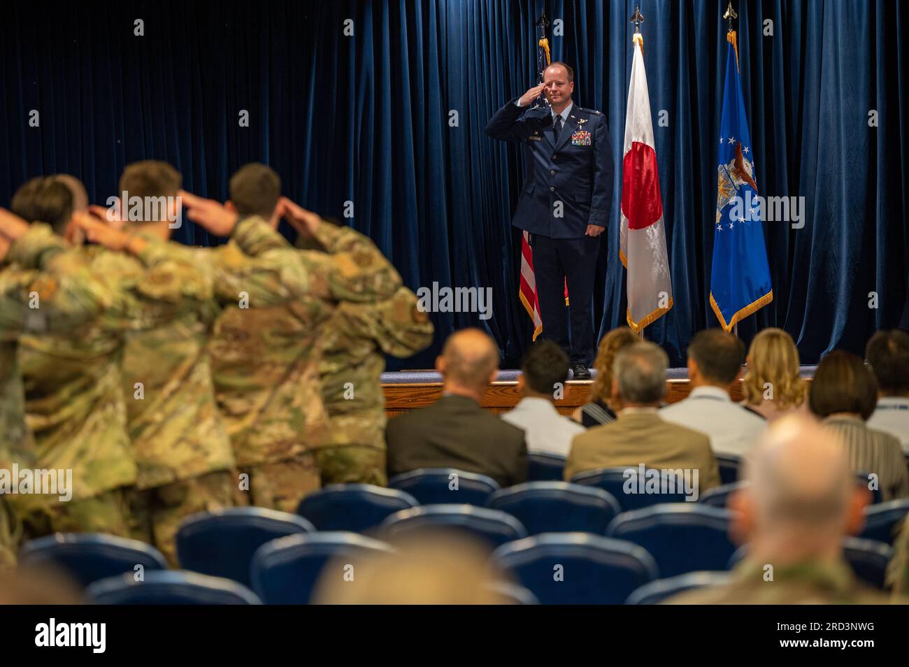 A formation of 374th Medical Group Airmen welcome Col. Gregory Richert ...
